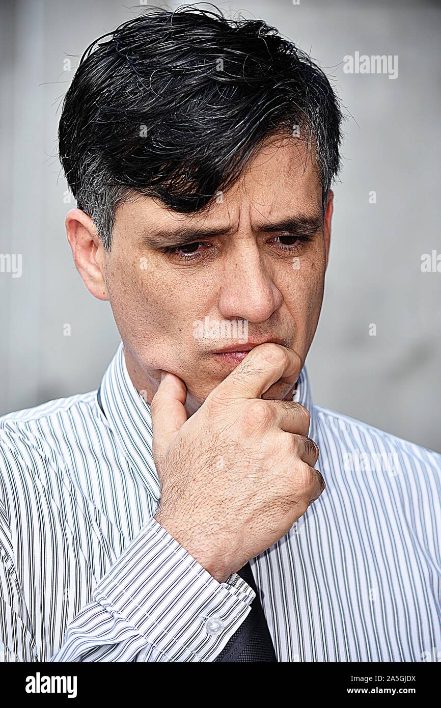 Confused Business Man Thinking Stock Photo - Alamy