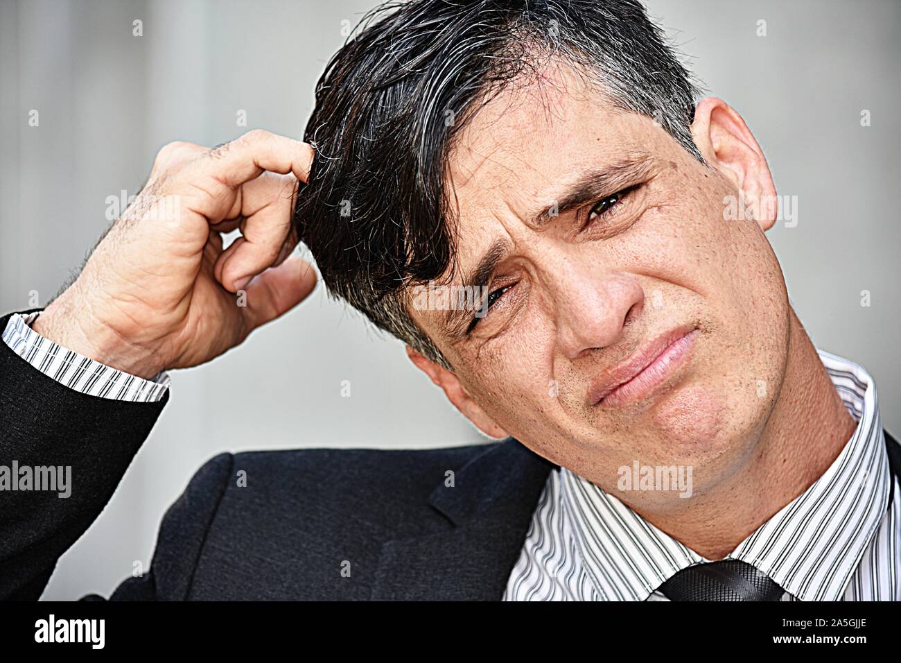 Confused business man hi-res stock photography and images - Alamy