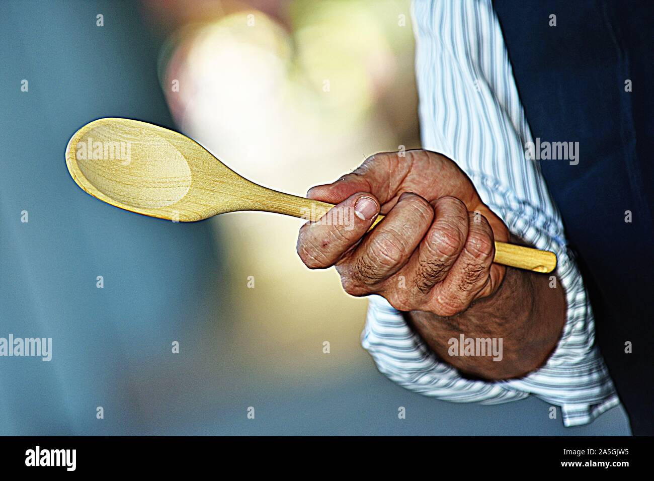 Male Chef Holding Cooking Spoon Stock Photo - Alamy