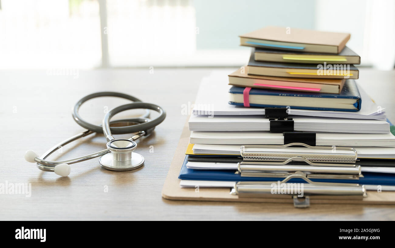 business man Office employee working contract with documents Stacks of ...