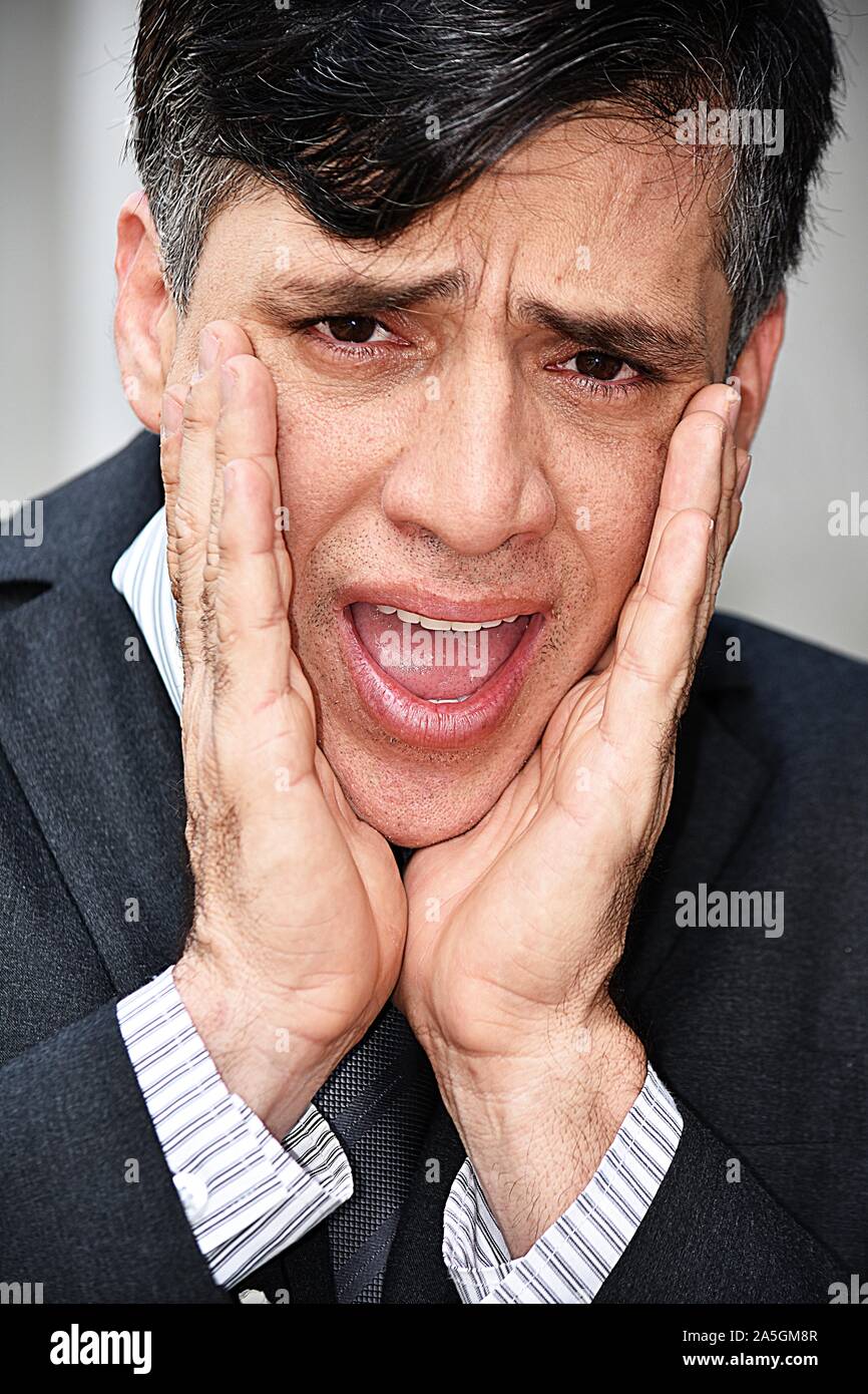 Startled Business Man Stock Photo - Alamy