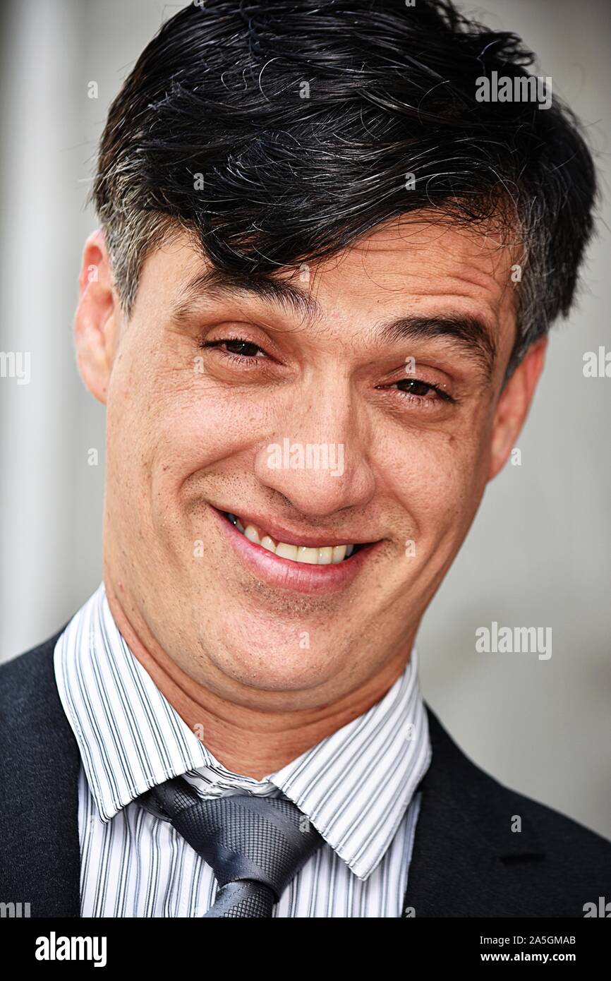 Silly Intelligent Business Man Wearing Suit And Tie Stock Photo - Alamy