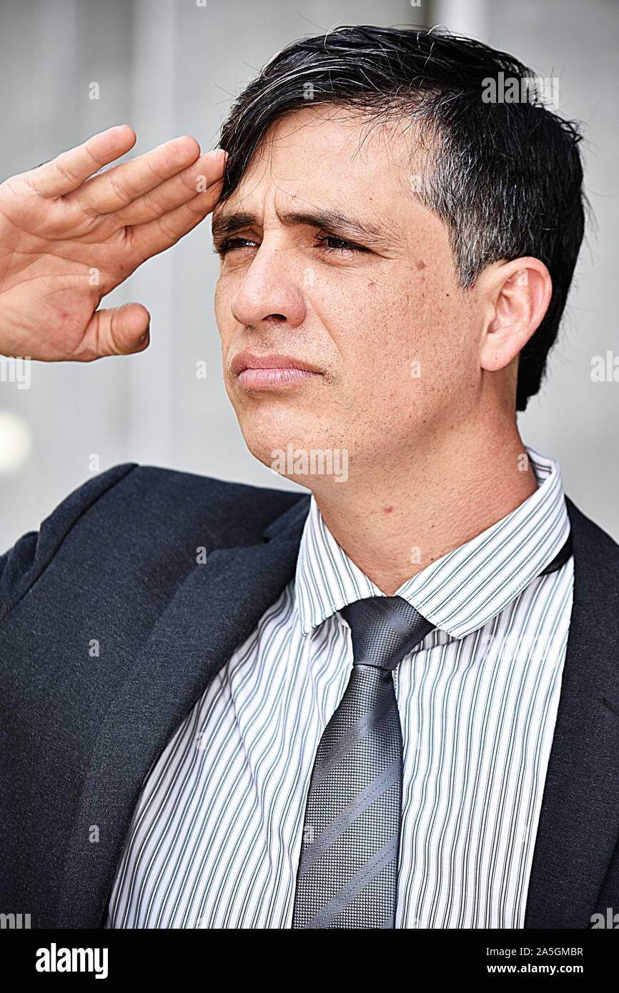 Hispanic Business Man Saluting Wearing Business Suit Stock Photo - Alamy Hispanic Business Man Saluting Wearing Business Suit Stock Photo - Alamy