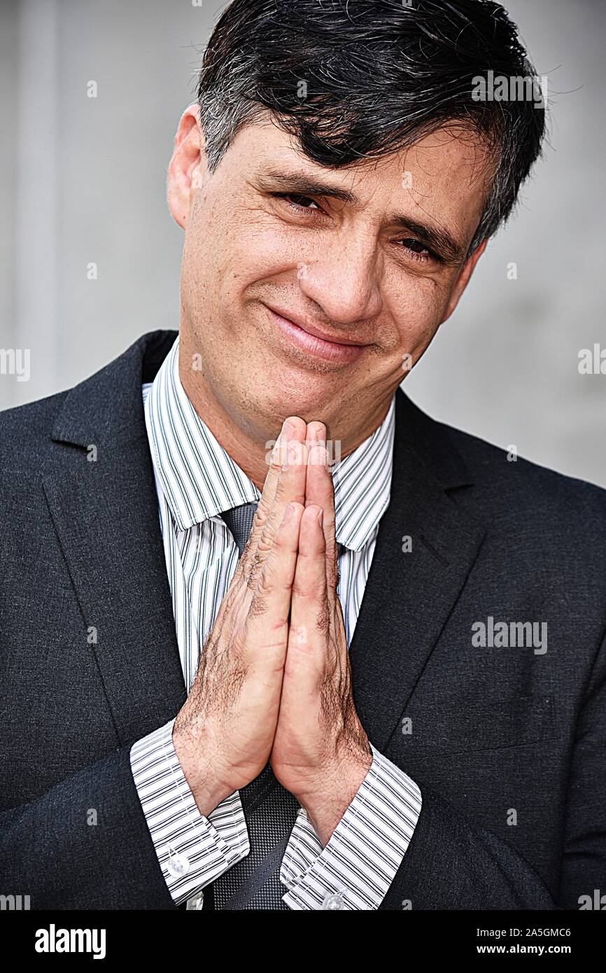 Business Man Praying Stock Photo - Alamy