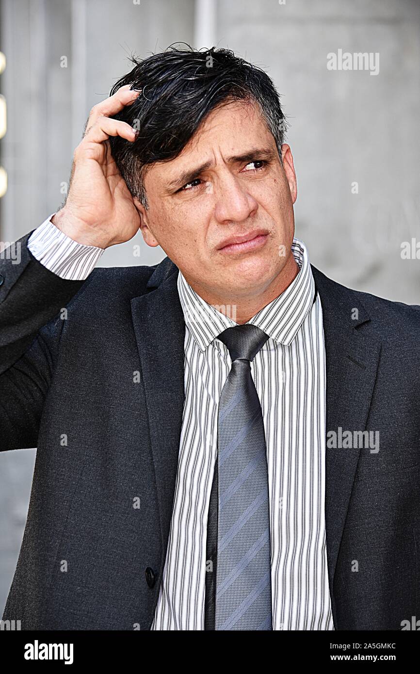 Suit man confused hi-res stock photography and images - Alamy