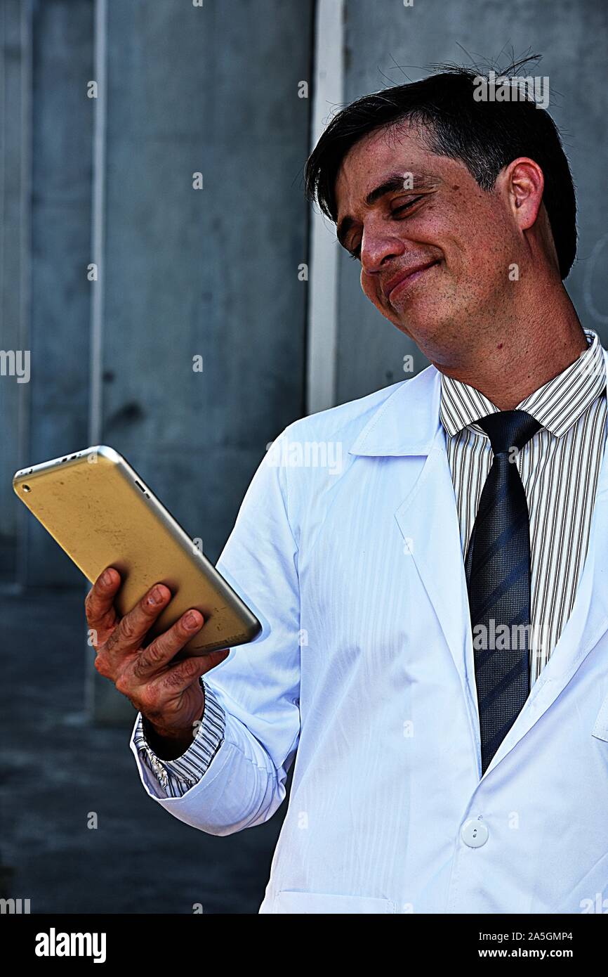 Happy Male Medic With Tablet Stock Photo - Alamy
