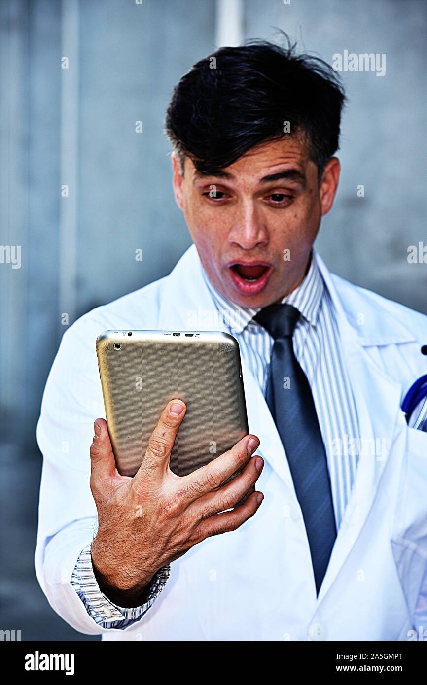 Confused Handsome Person Wearing Lab Coat Stock Photo - Alamy