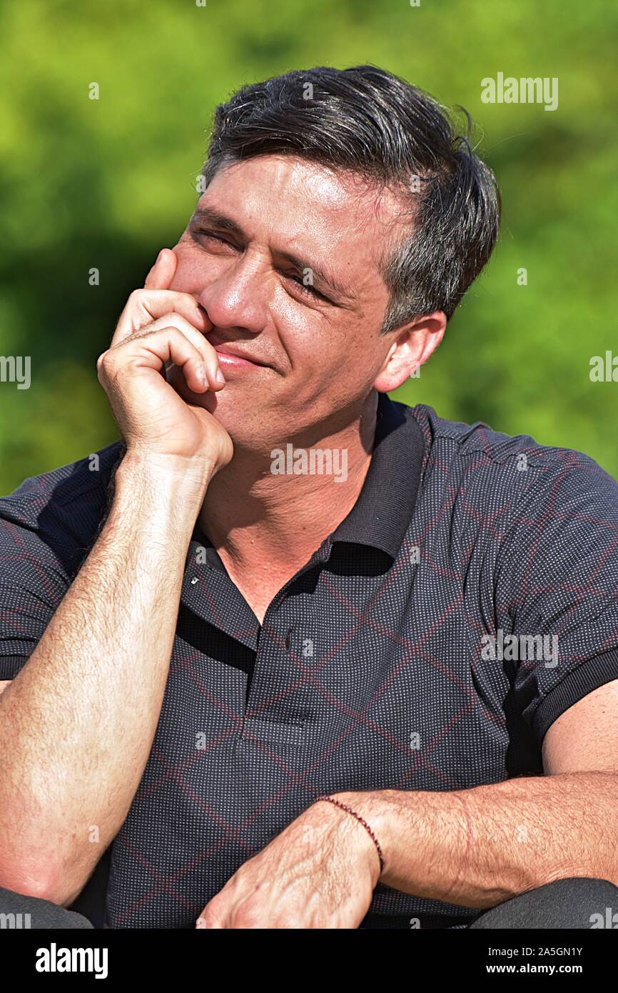 Happy hispanic male hi-res stock photography and images - Alamy