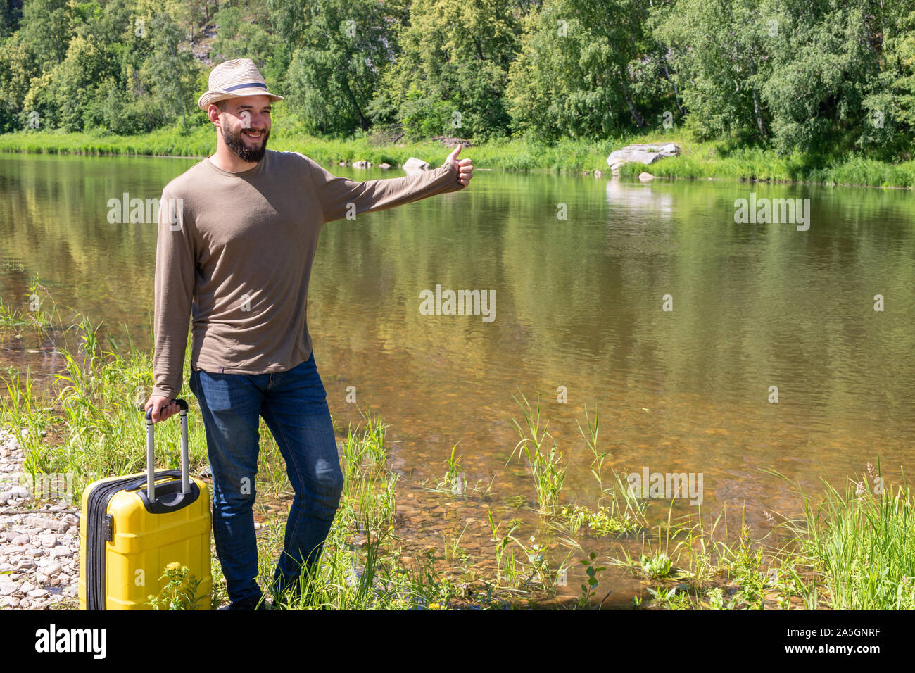 Thumb a lift hi-res stock photography and images - Alamy