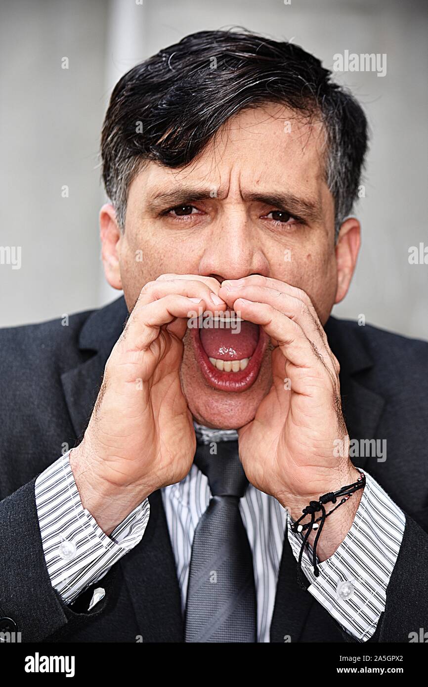 Smart Entrepreneur Shouting Stock Photo - Alamy
