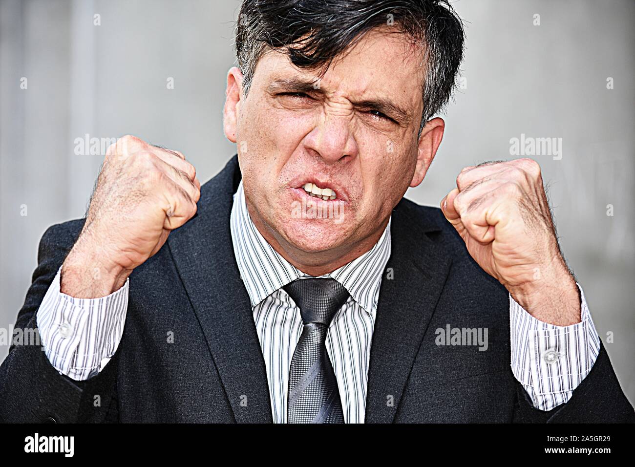Angry Smart Business Man Wearing Suit And Tie Stock Photo - Alamy