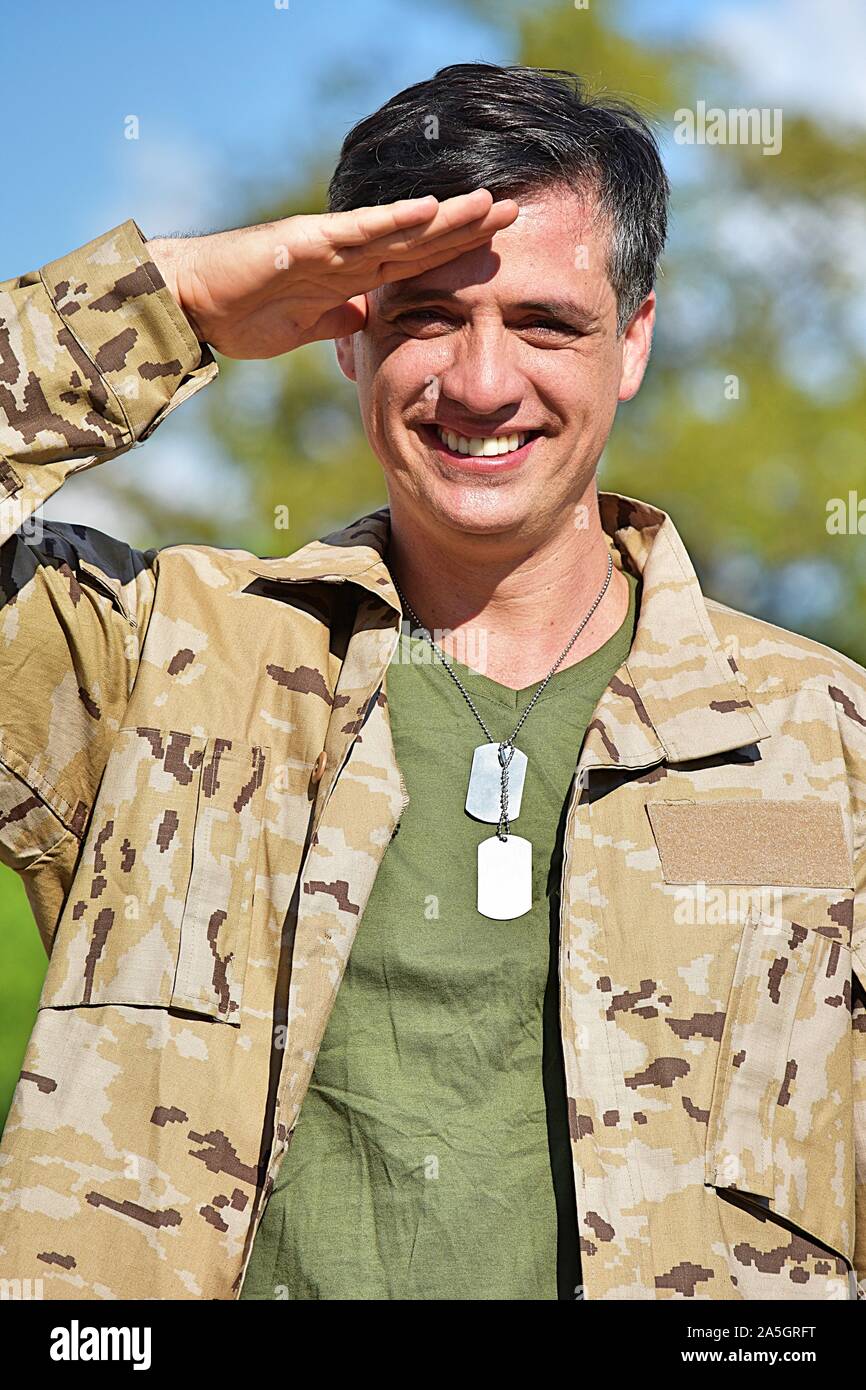 Minority Male Soldier Saluting Stock Photo - Alamy