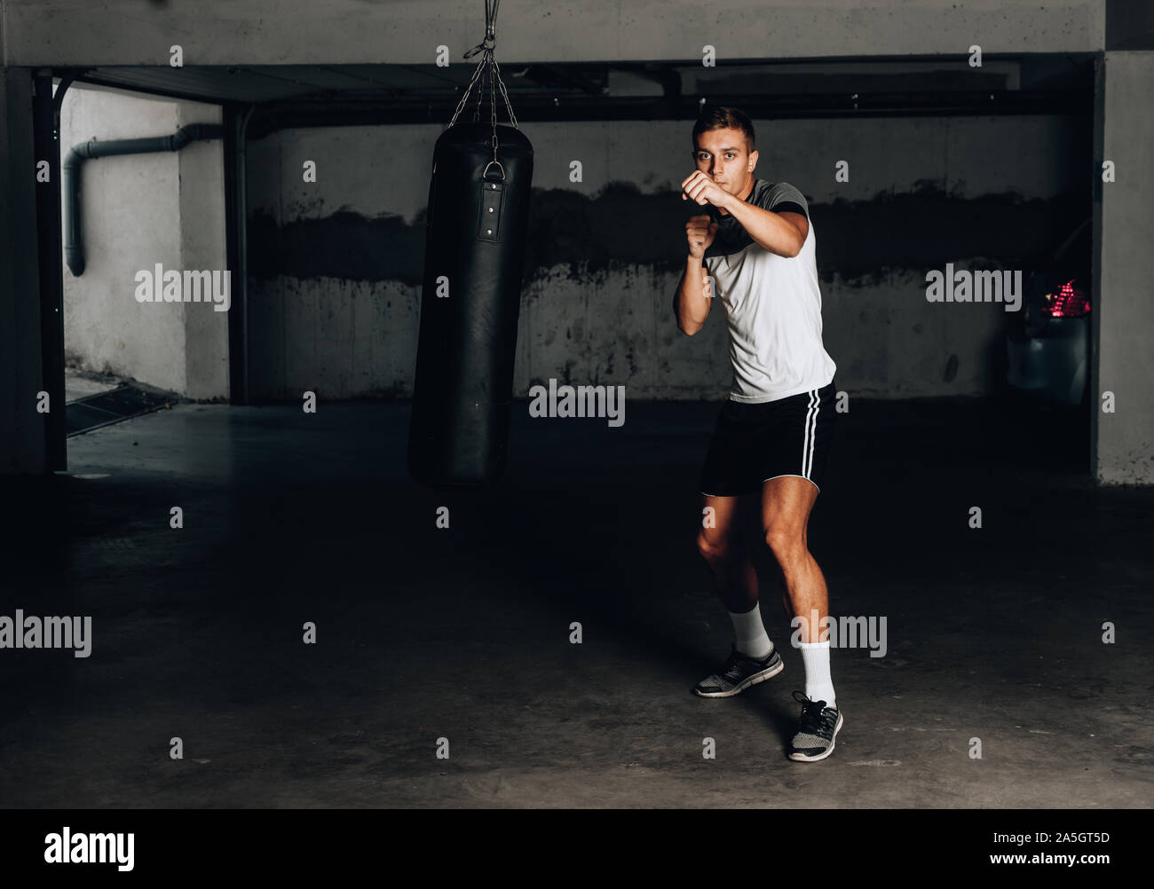 Fighter position while practicing boxing workout Stock Photo - Alamy