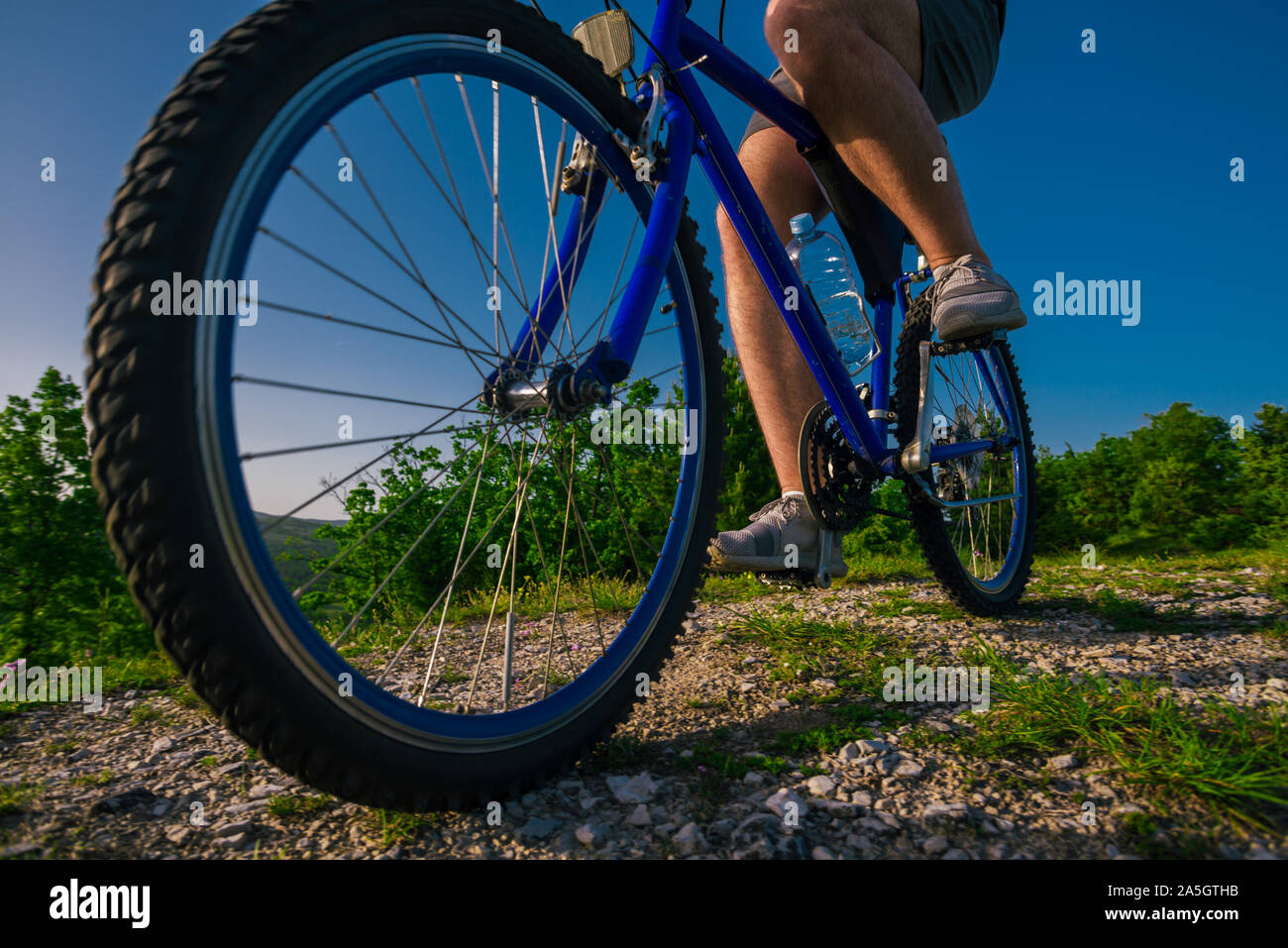 Close up photo from a mountain biker riding his bike ( bicycle) on ...