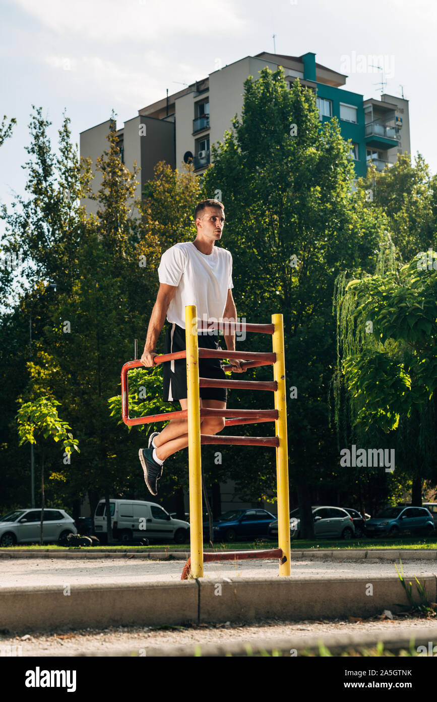 Slim athlete a very fit guy fitness instructor or a personal trainer ...