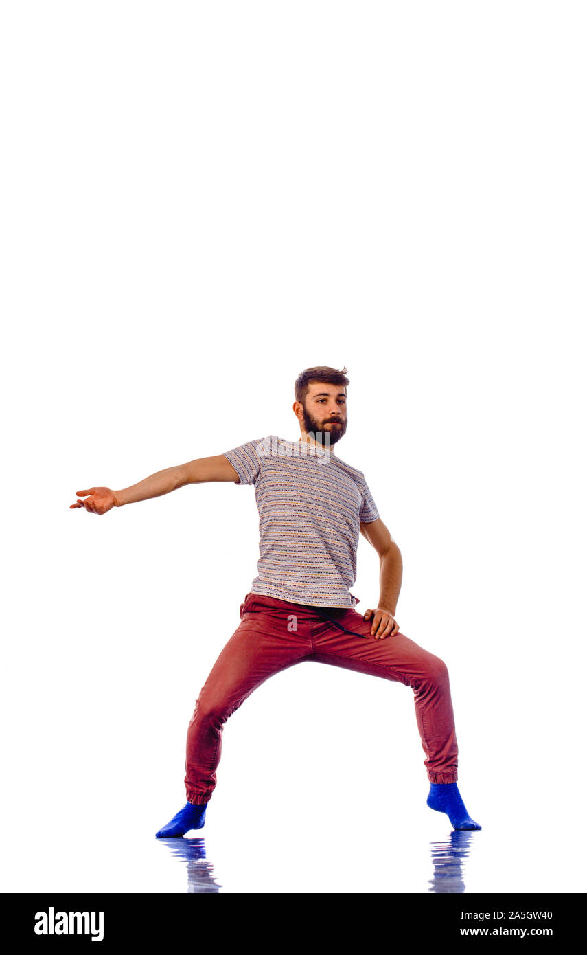 Cool guy doing brakdance on white background Stock Photo - Alamy