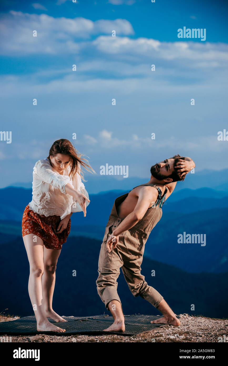 Young beautiful barefoot couple dancer practicing modern dance Stock ...