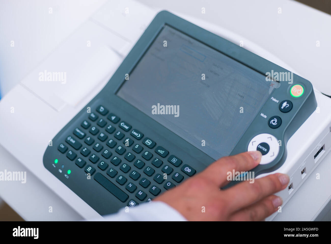 Doctor with close up of ekg machine hi-res stock photography and images ...