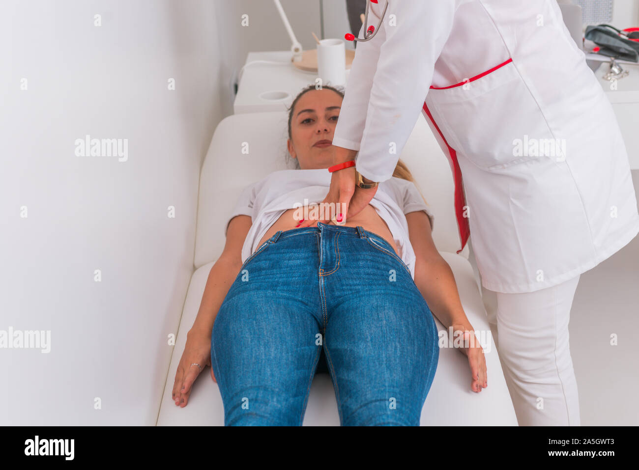 Close up photo of a reflexes examination on a teenage girl Stock Photo ...