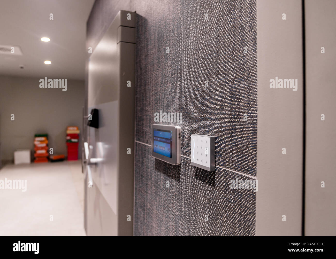 Metal vault door with touchscreen and keypad for authorization and ...