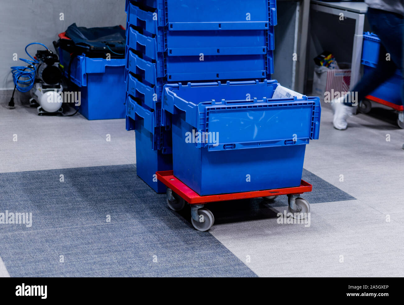 Blue maintenance boxes stacked together used for various purposes ...