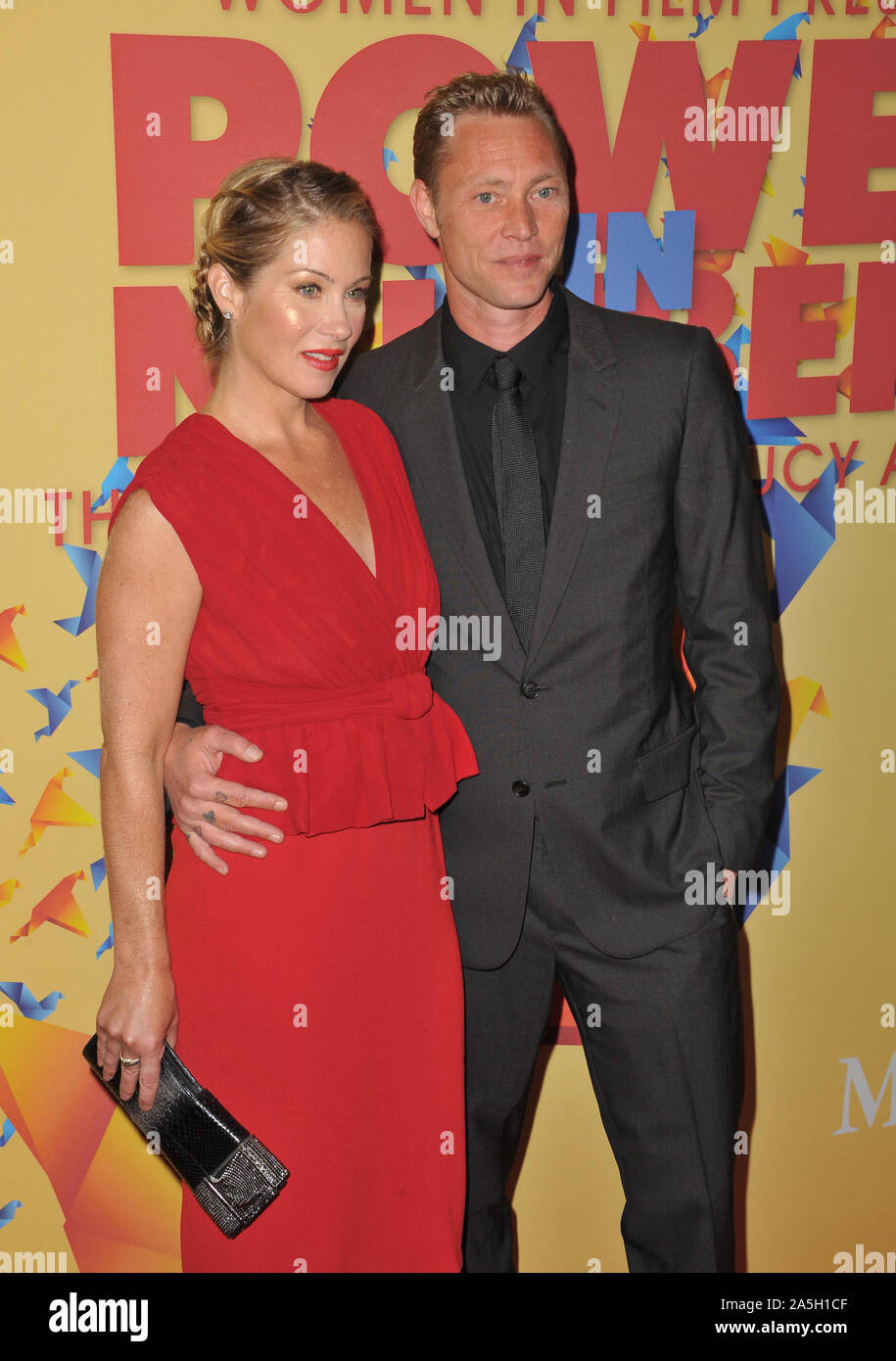 LOS ANGELES, CA. June 12, 2012: Christina Applegate & date at the Women ...