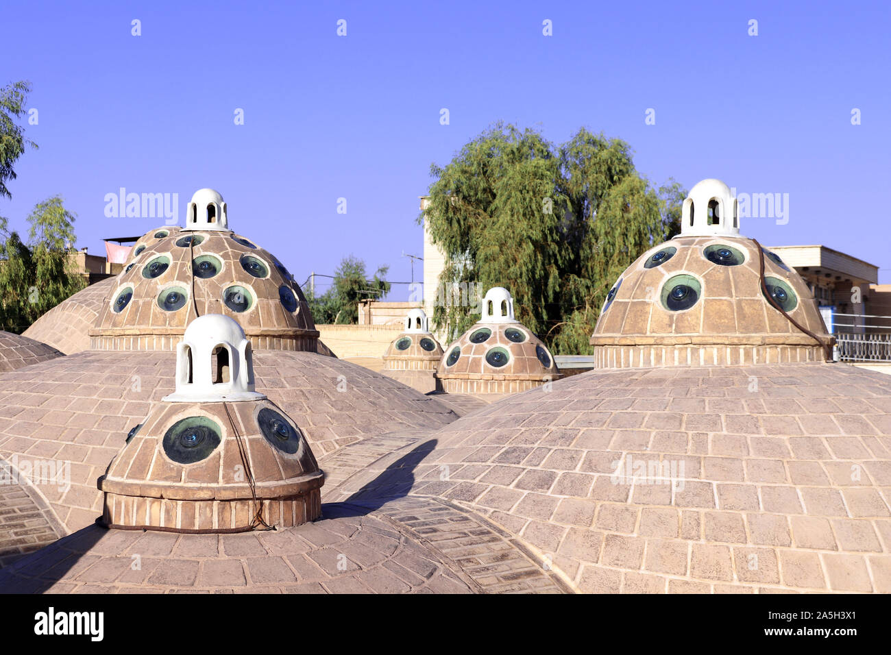 Roof of traditional iranian Sultan Amir Ahmad bathhouse with domes with ...