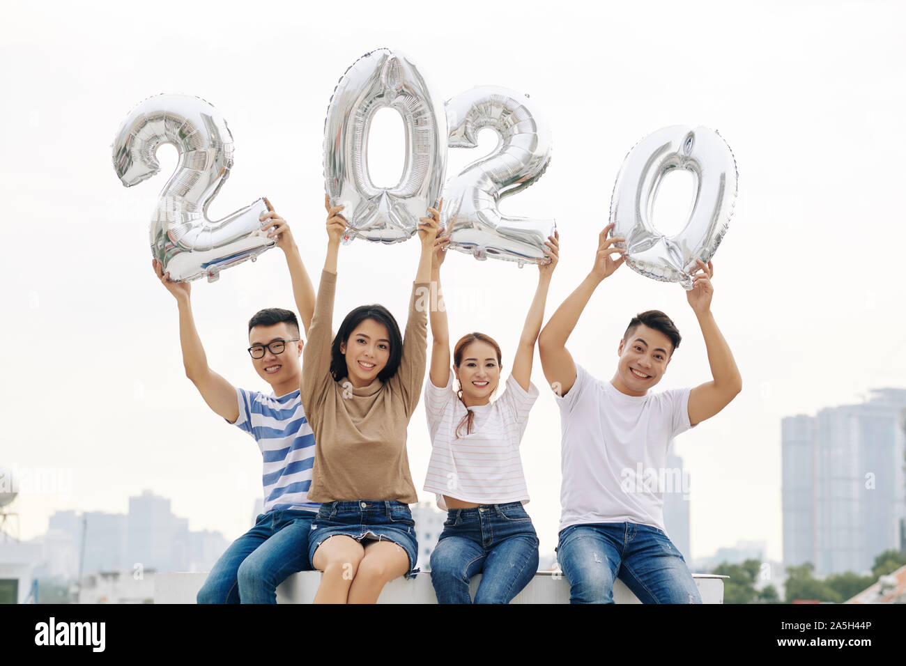 Group of indian women raising hands hi-res stock photography and images ...