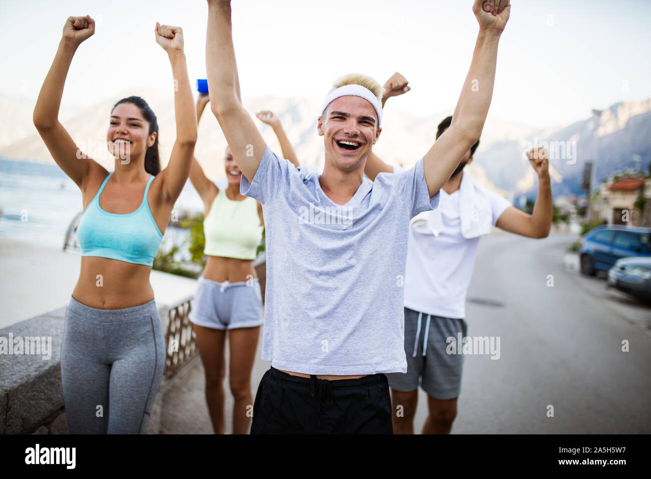 Group of young people jogging and running outdoors in nature Stock ...
