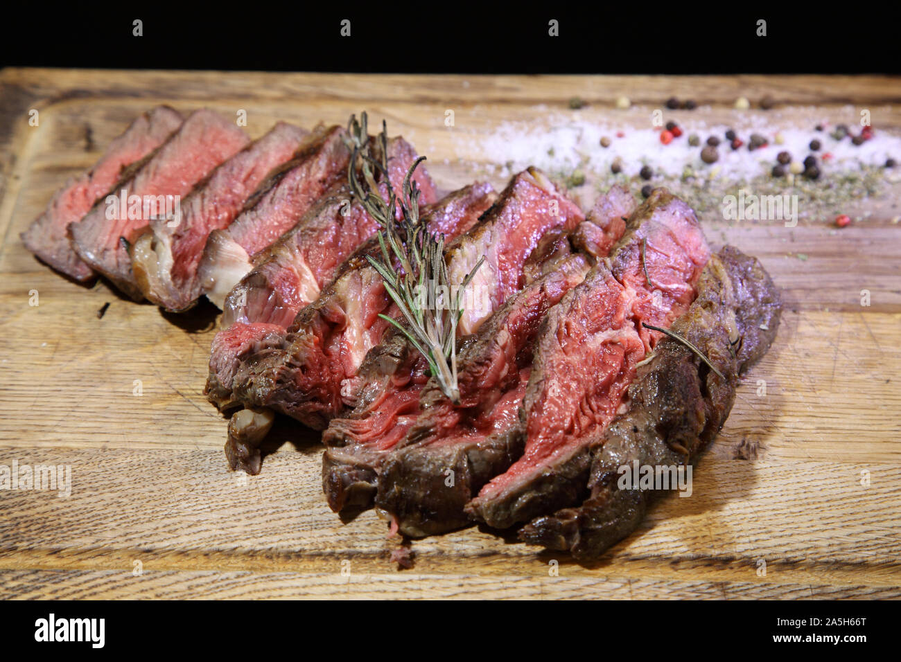 Delicious steak. Beef steak medium rare on vegetable cushion. Beef ...