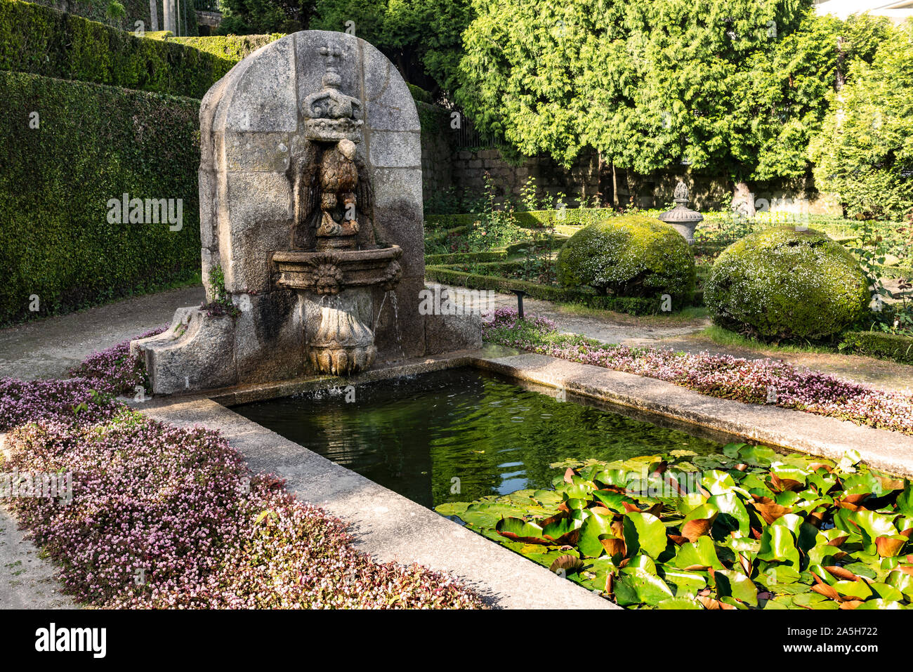 fountain with water lillies Stock Photo - Alamy