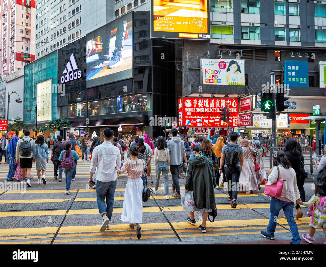 People crossing Yee Wo street. Causeway Bay, Hong Kong, China Stock ...