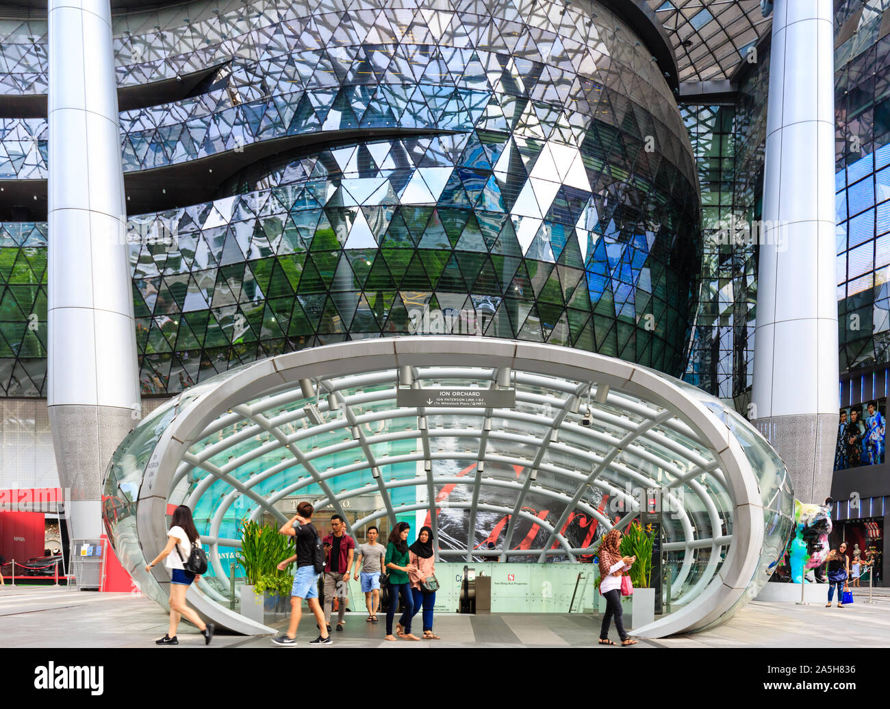 Singapore-06 MAY 2018:Entrance to the escalator going downwards at ION ...