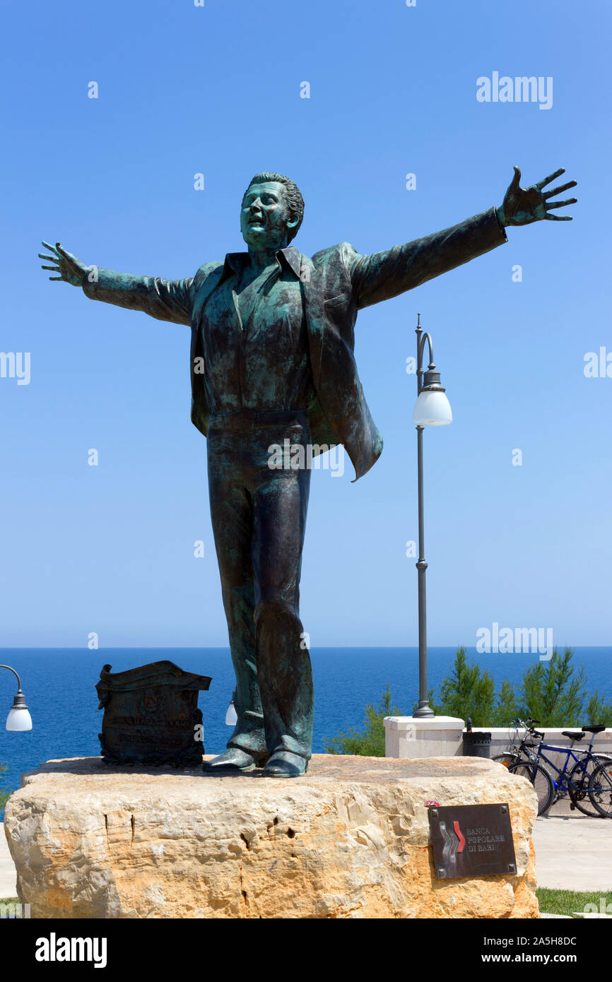 Italy, Apulia, Polignano a Mare, Domenico Modugno statue Stock Photo ...