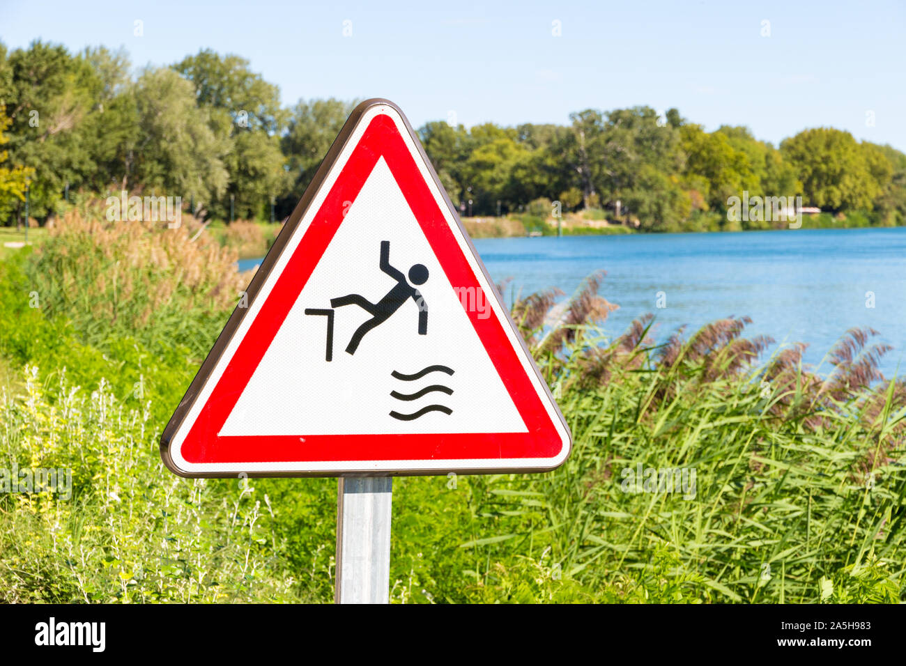 Fall hazard sign with The Pont Saint Benezet or Avignon bridge in the ...