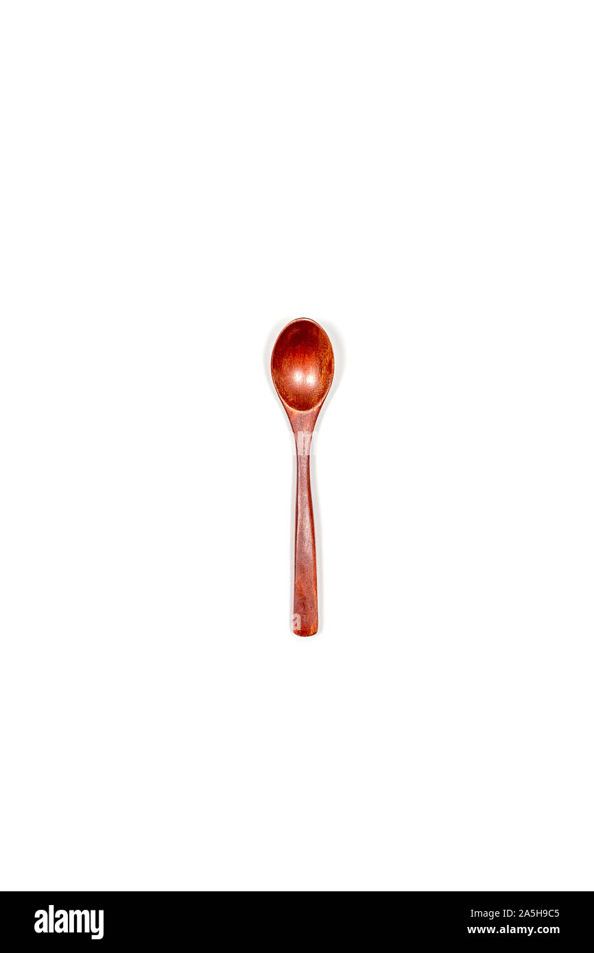 Top view of handmade wooden empty spoon isolated on white background ...