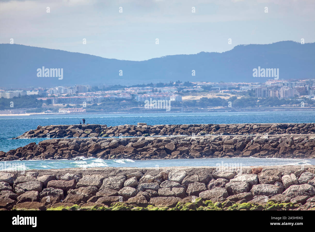landscape with breakwaters on the ocean shore Stock Photo - Alamy