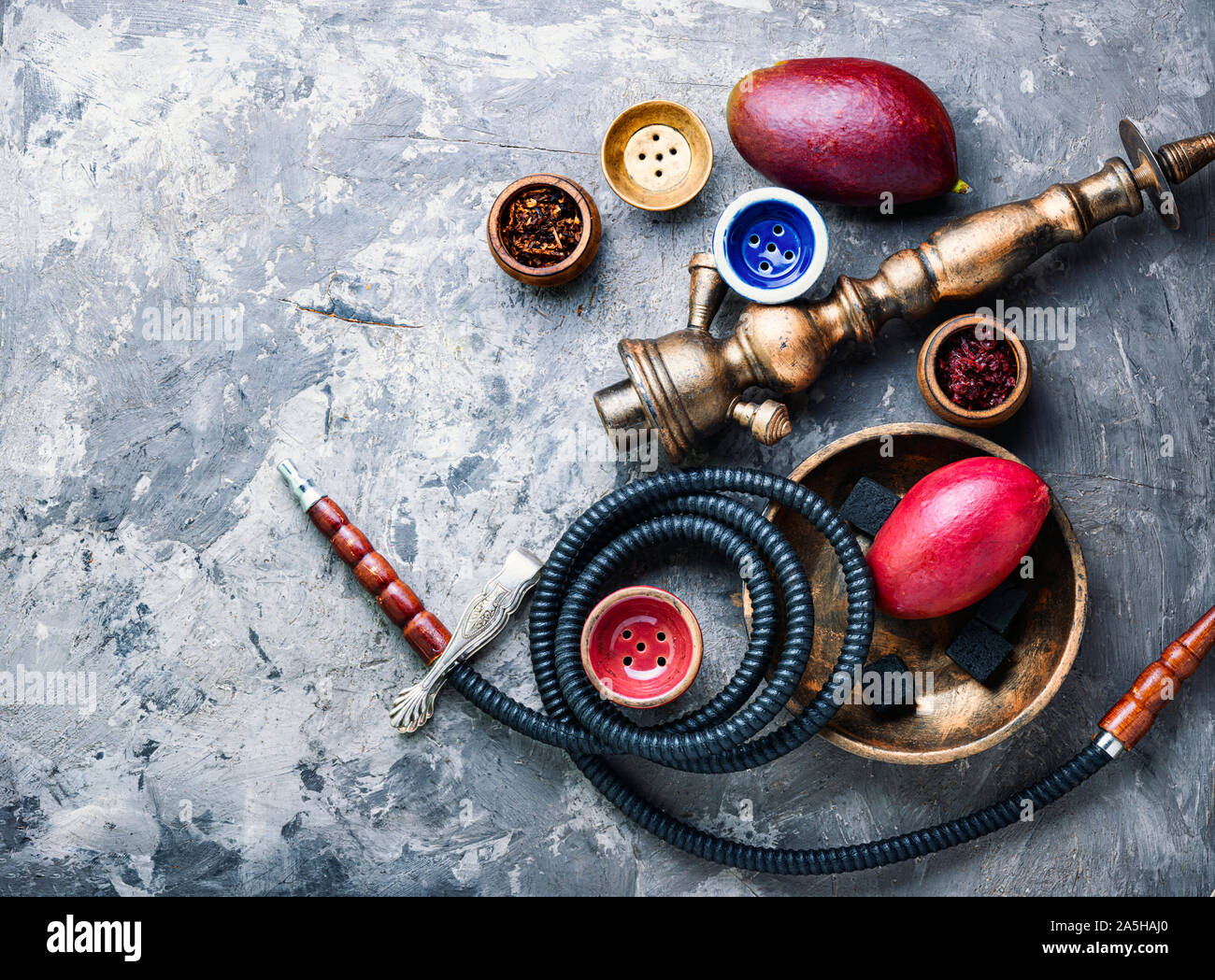 Smoking hookah.Details of oriental shisha.Shisha with mango flavor of ...