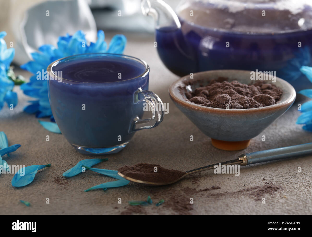 blue masala tea powder on a gray background Stock Photo - Alamy
