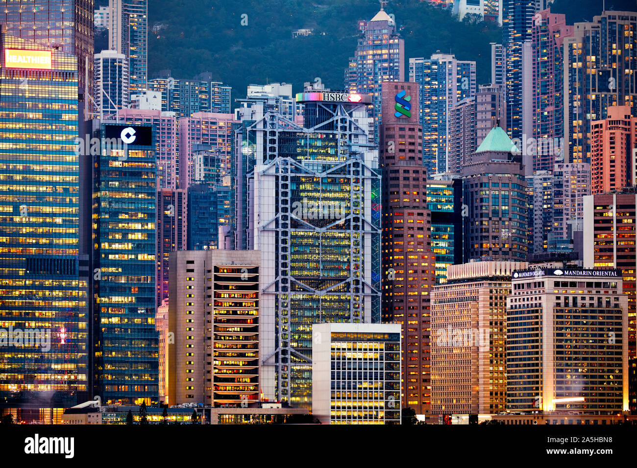 Modern high-rise buildings at Central Waterfront illuminated at night ...