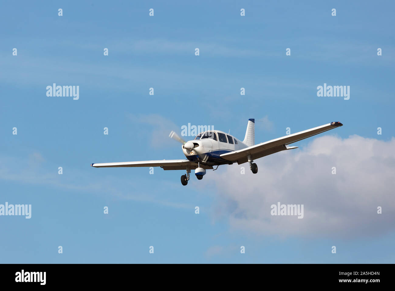 sports aiplane flying mid air Stock Photo - Alamy