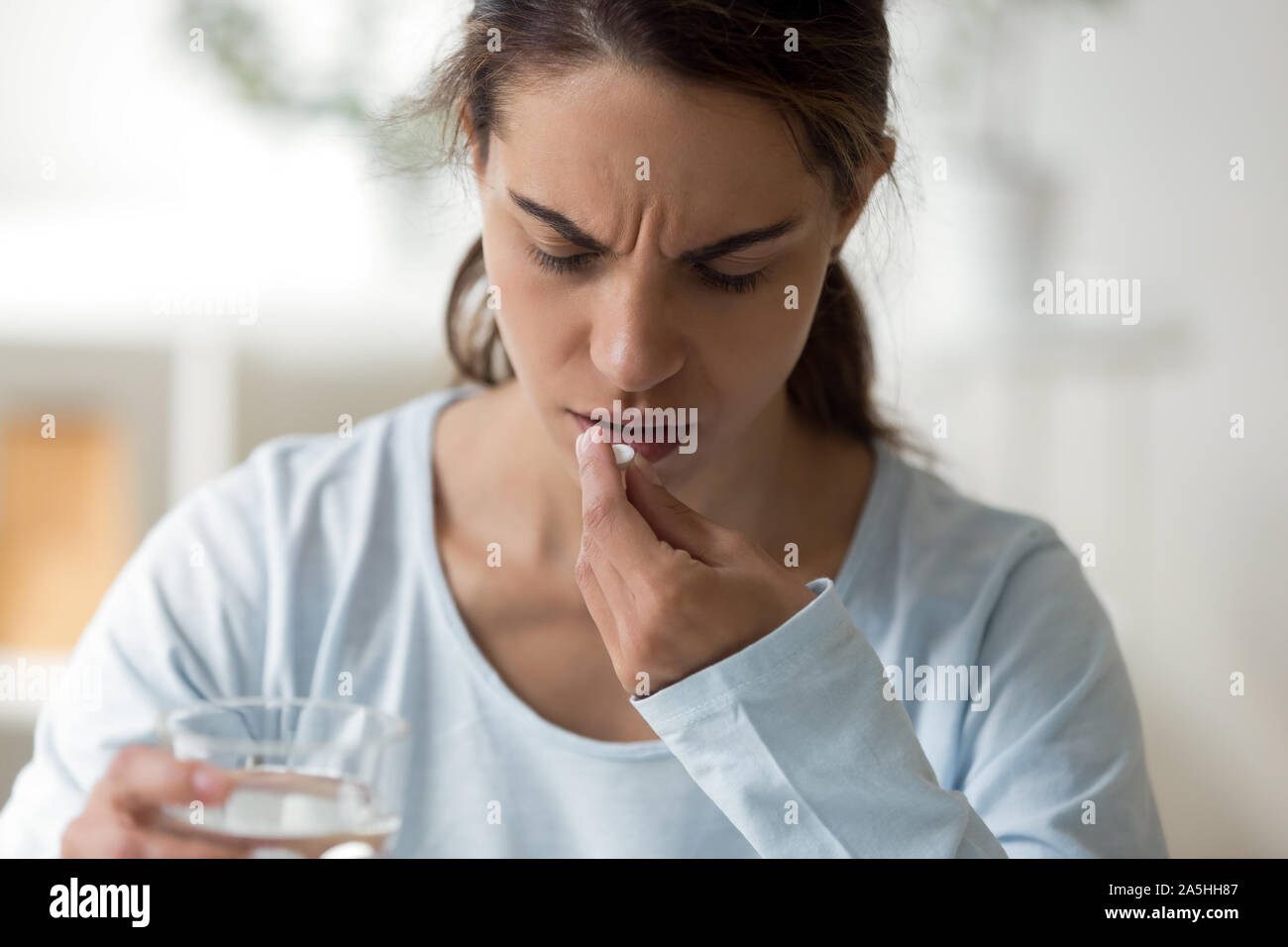 Female painkiller hi-res stock photography and images - Alamy