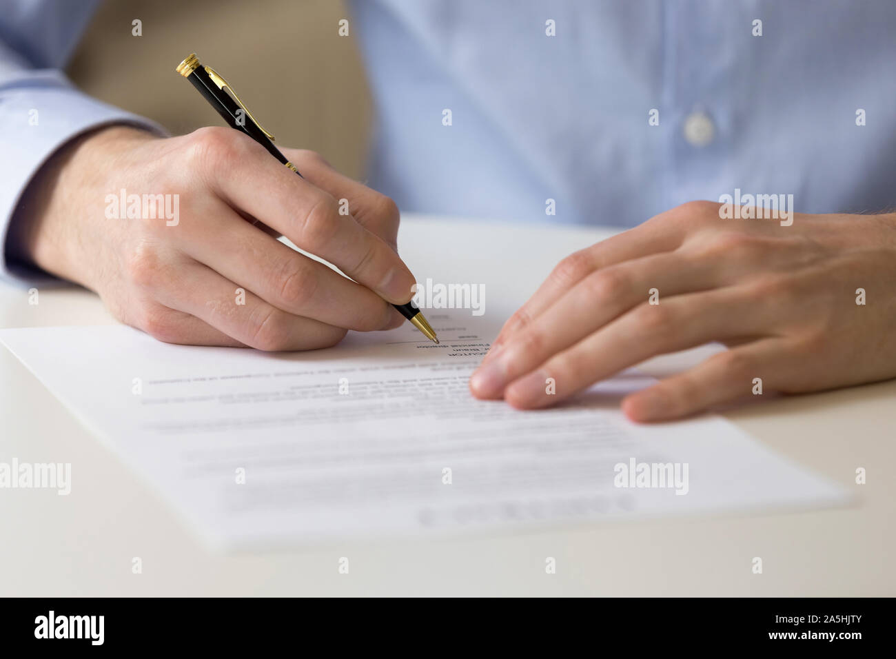 Successful male entrepreneur signing contract agreement, bank loan form ...