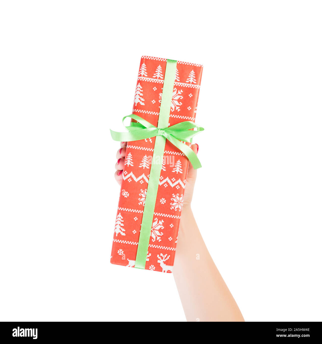 Woman hands give wrapped Christmas or other holiday handmade present in ...