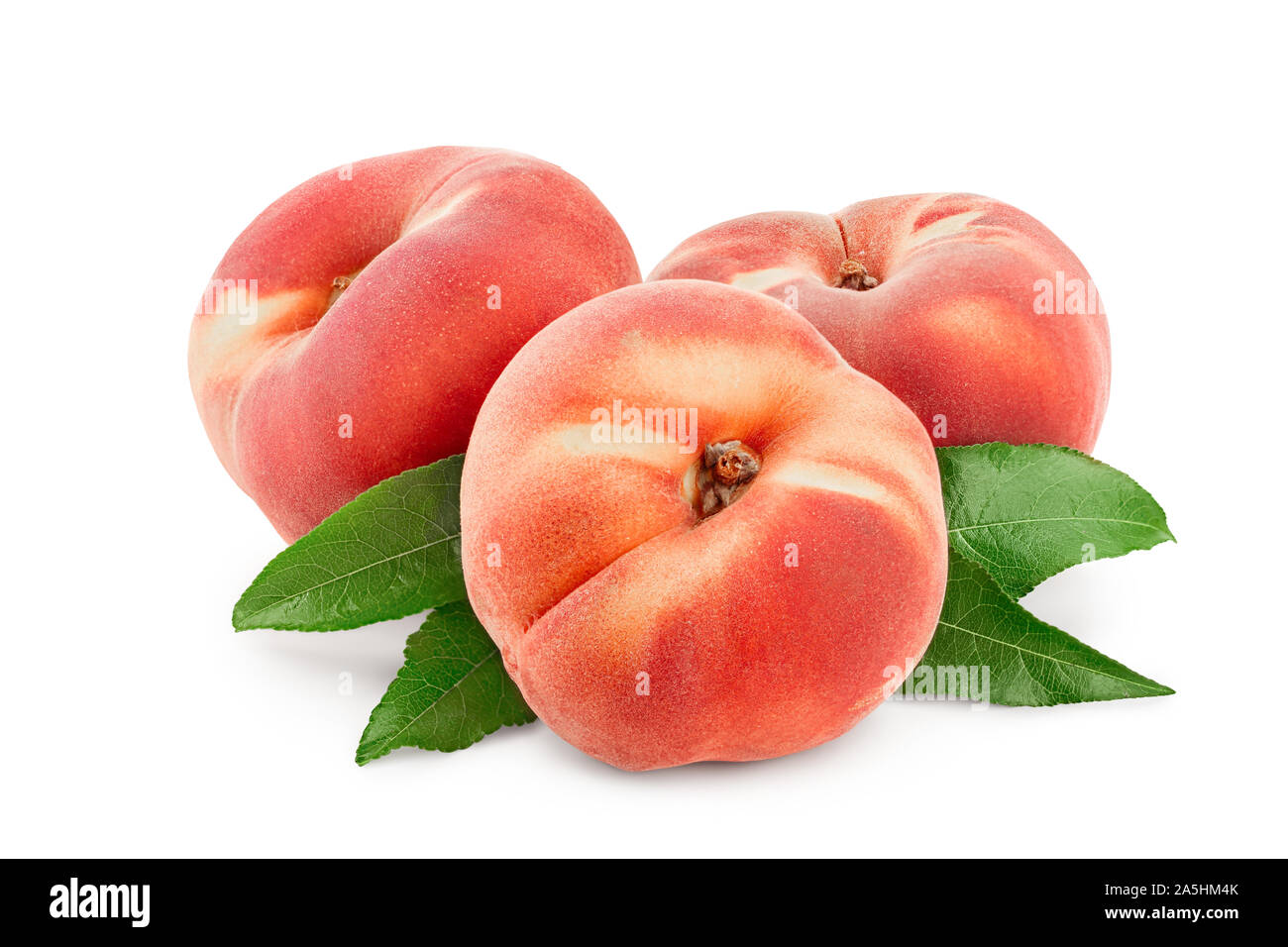 Ripe chinese flat peach fruit with leaf isolated on white background ...