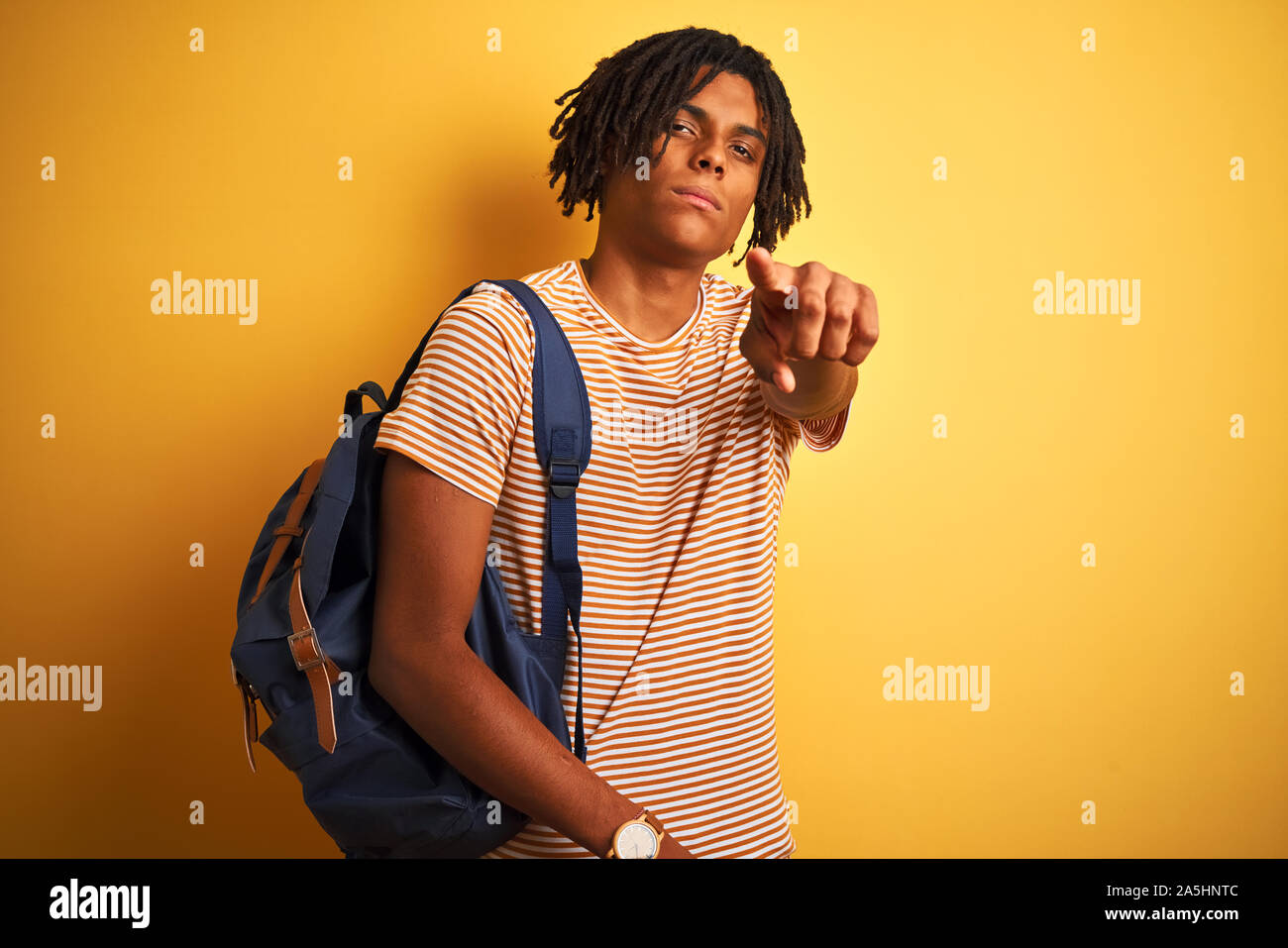 Afro american student man with dreadlocks wearing backpack over ...