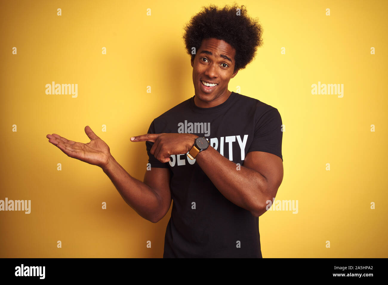 American safeguard man with afro hair wearing security uniform over ...