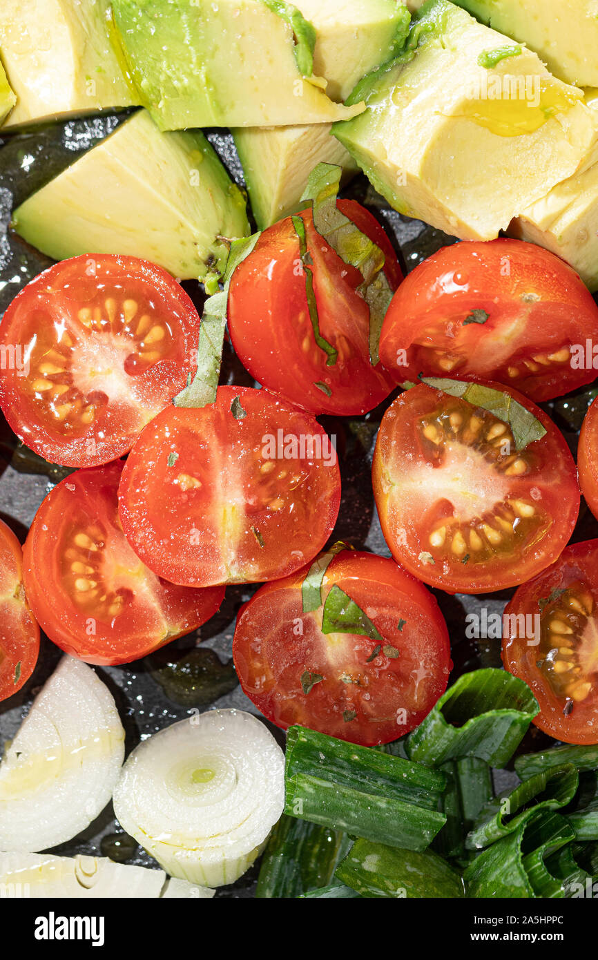 Salad - avocado, spring onion and tomato stock photo. Top View Stock ...