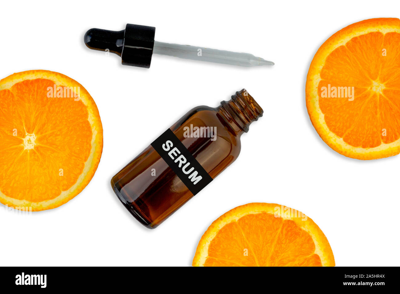 Vitamin C serum in cosmetic bottle with dropper, sliced orange on white ...