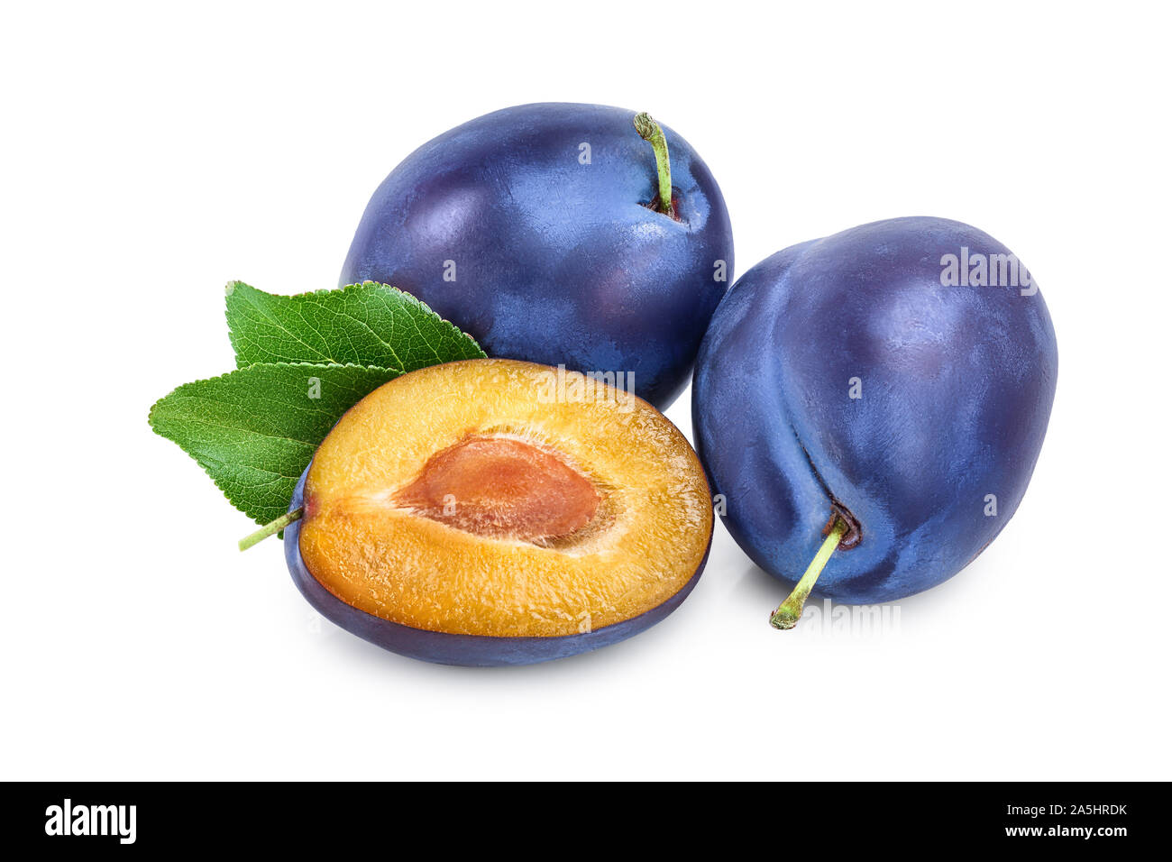 fresh blue plum and half with leaves isolated on white background Stock ...